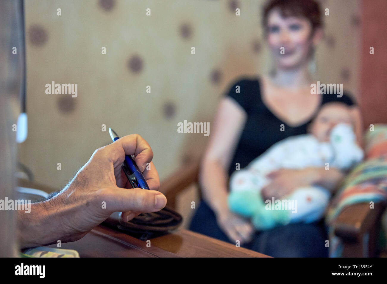 Office man woman baby hi-res stock photography and images - Alamy