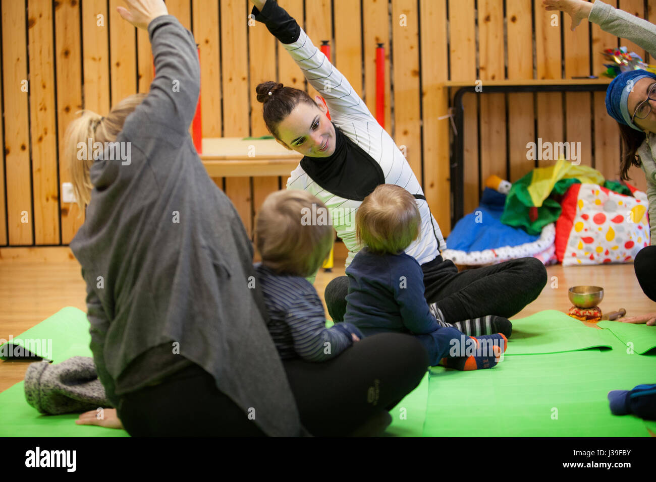 MOTHER AND CHILD PRACTICING YOGA Stock Photo - Alamy
