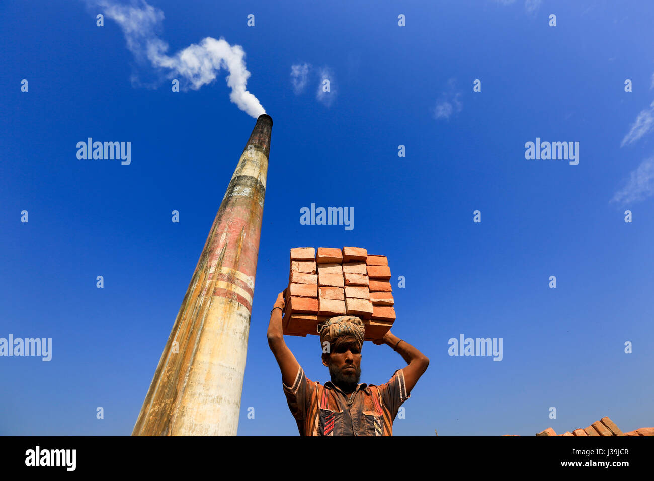A labourer works at brickfield at Amin Bazar. Dhaka, Bangladesh Stock ...