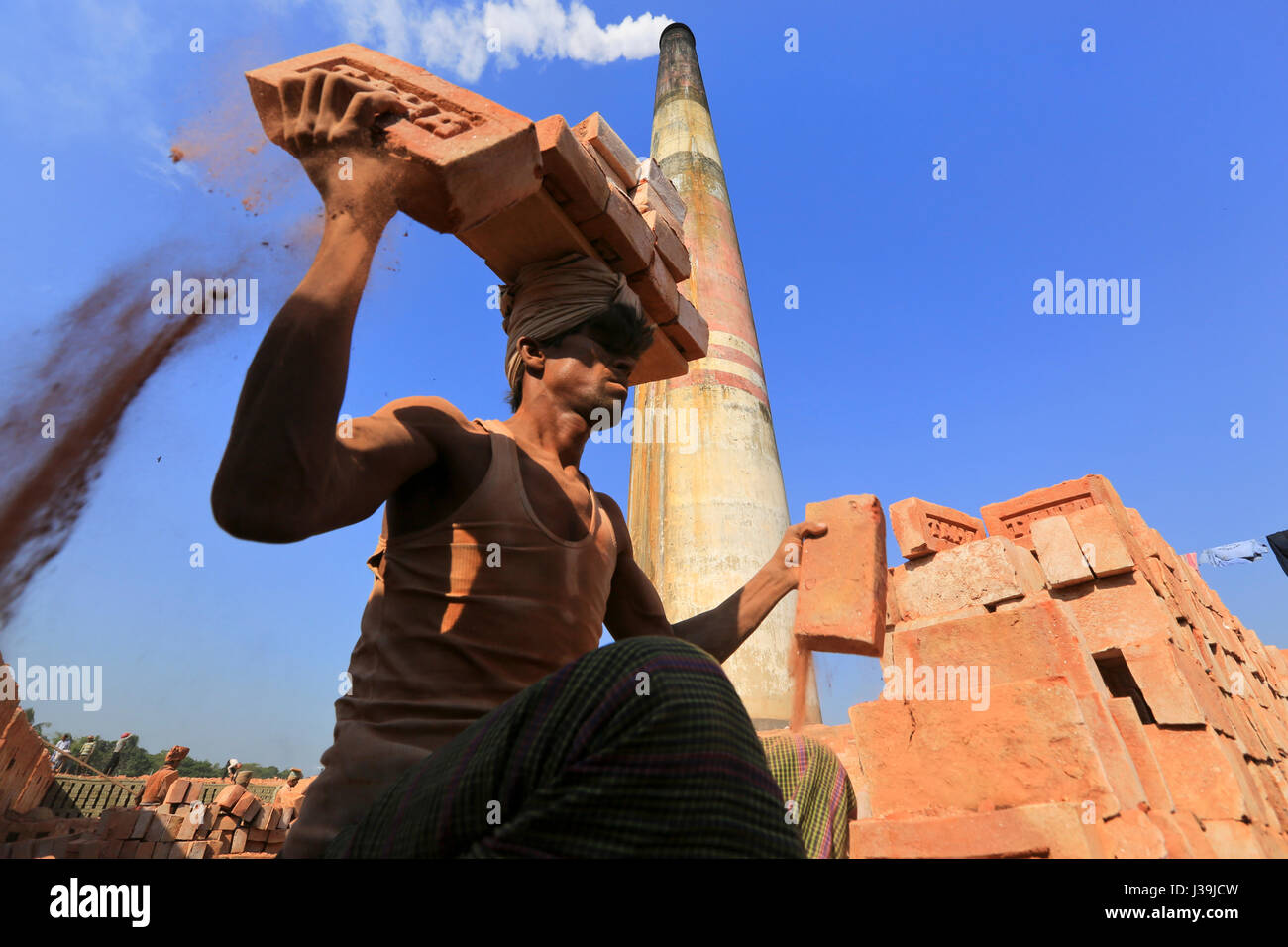 A labourer works at brickfield at Amin Bazar. Dhaka, Bangladesh Stock ...