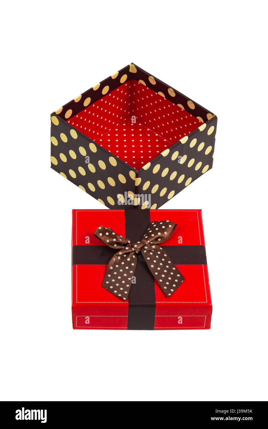Gift box dark brown color and yellow dot with red cap and ribbon ...