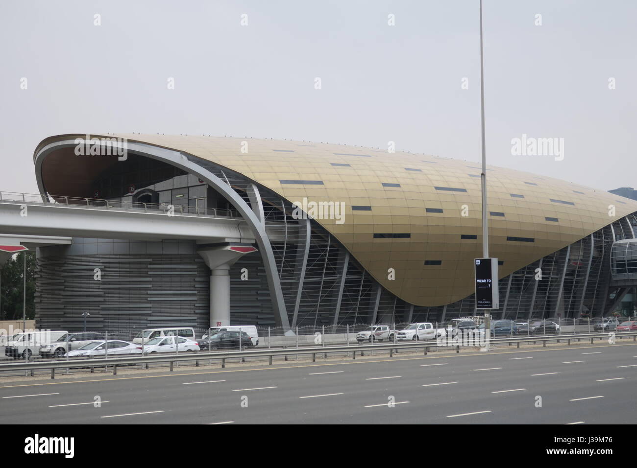 Golden shiny roof of metro station in Dubai city, United Arab Emirates ...