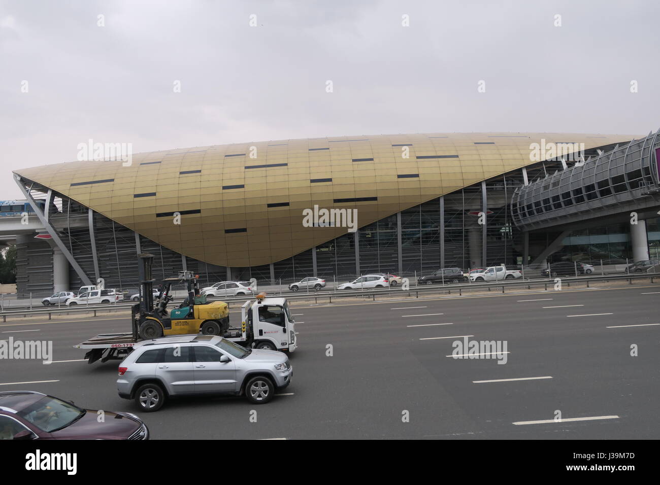 Golden shiny roof of metro station in Dubai city, United Arab Emirates ...