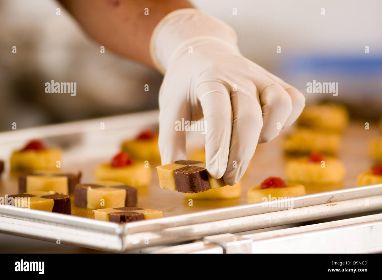 Bakery man preparing delicious christmas cookies in a bakery store ...