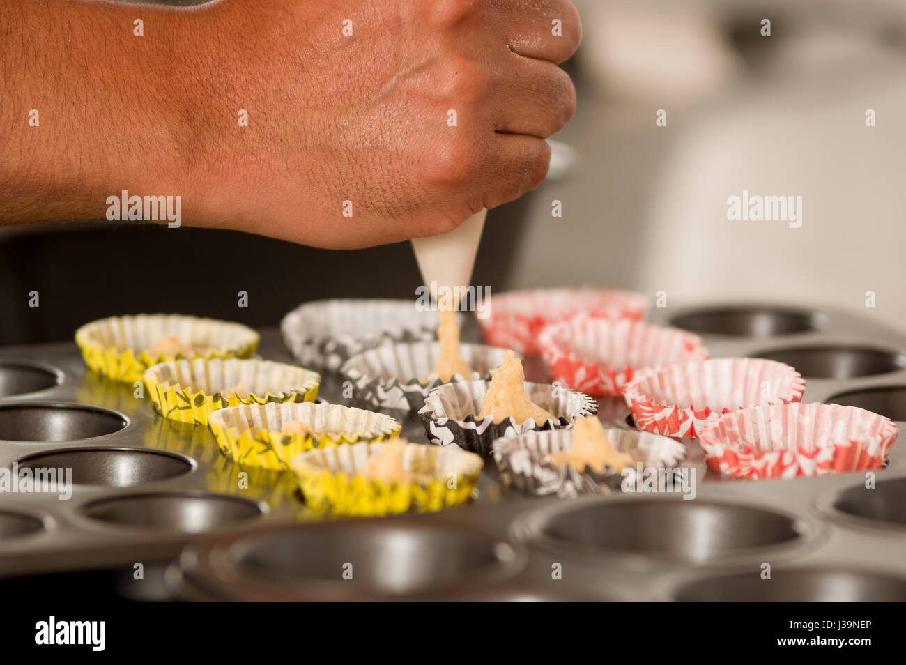 A bakery man is preparing a delicious christmas cookies in a bakery ...