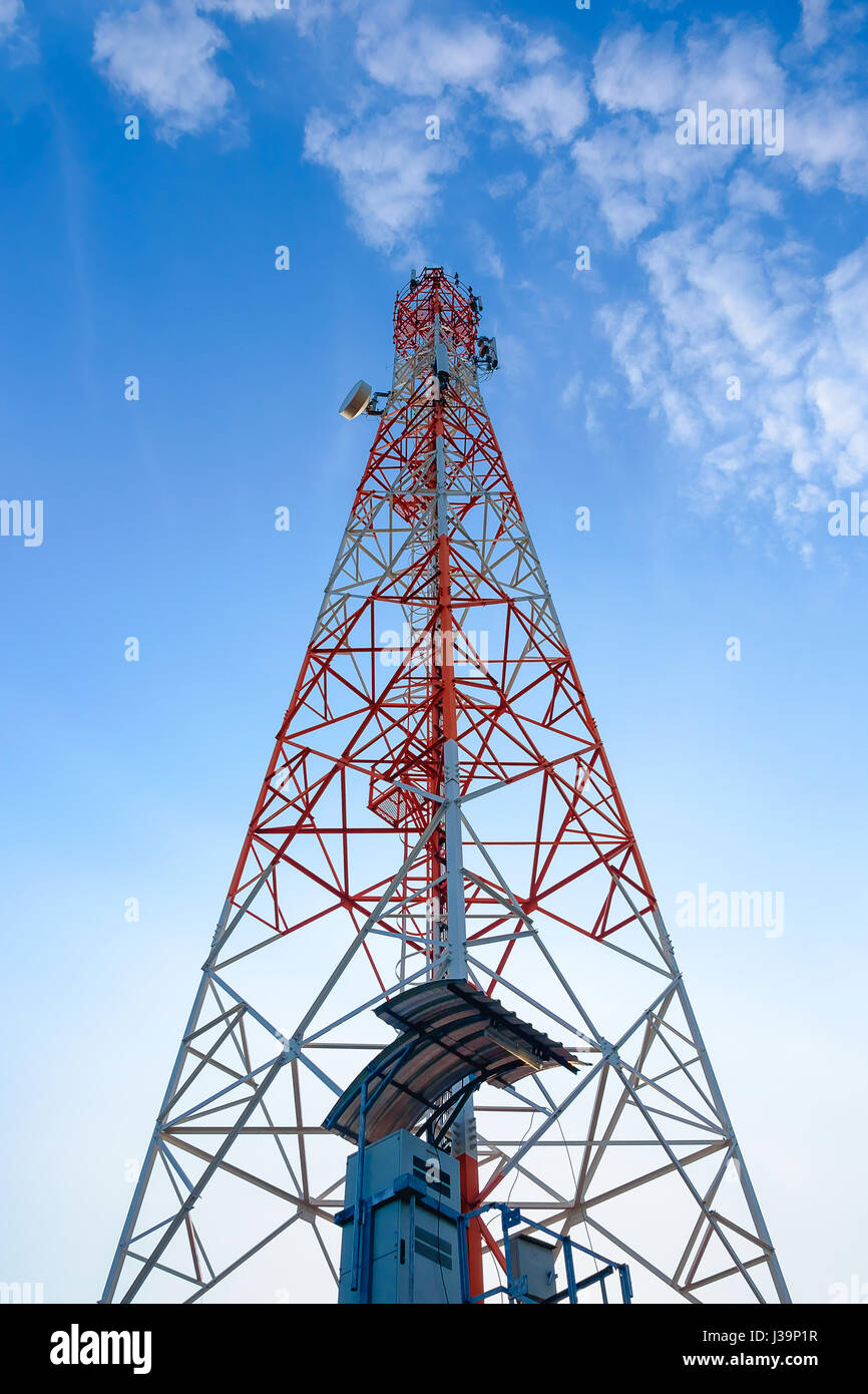 Mobile phone communication antenna tower with the blue sky and clouds, Telecommunication tower ...