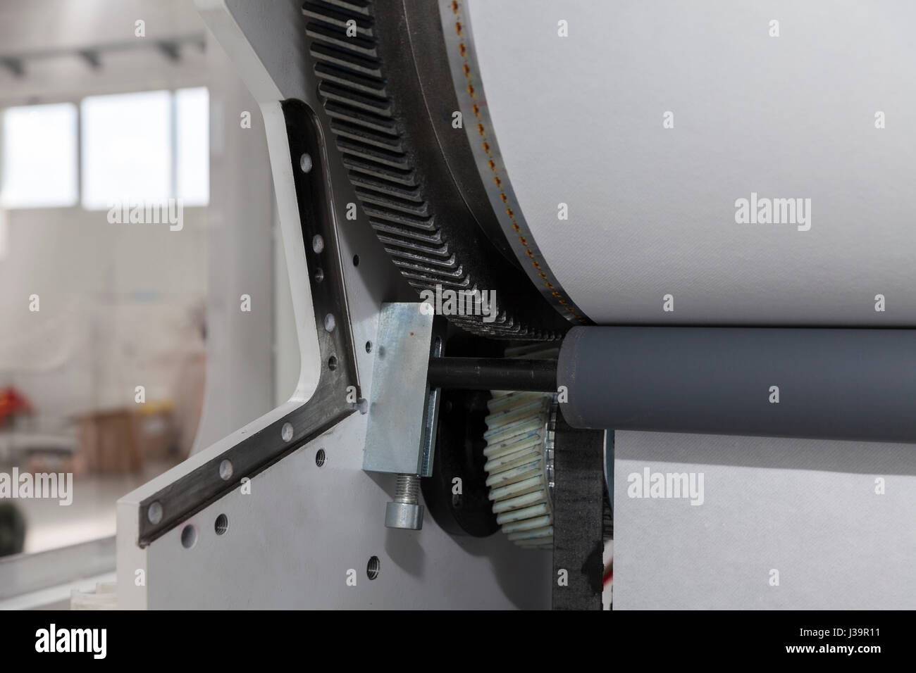 paper rolling machine, white paper on roll Stock Photo - Alamy