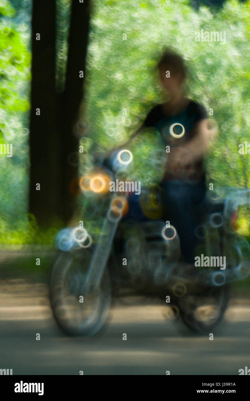 Abstract picture of a motorcyclist riding a motorcycle. Blur Stock ...