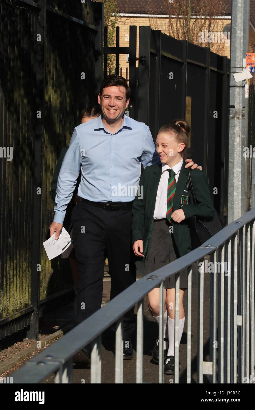 Labour candidate Andy Burnham arrives with his daughter, Annie, at a ...