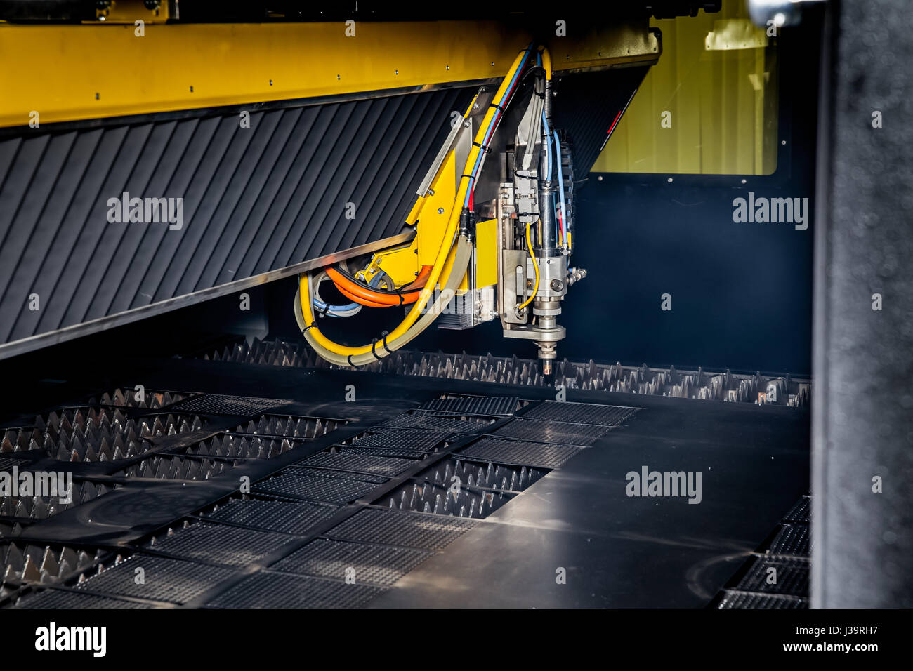 Laser cutting machine Stock Photo - Alamy