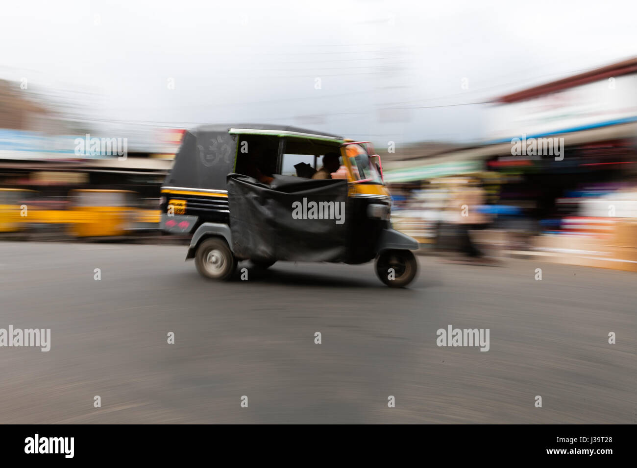 Speedy rickshaws tuk tuks showing movement blur Stock Photo - Alamy