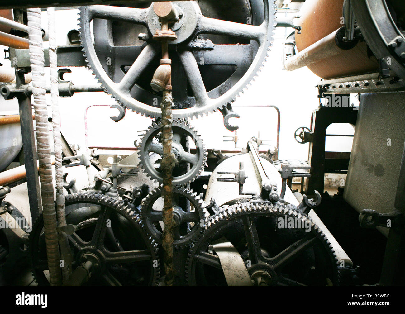 Old run down industrial plant machinery with cogs and gear wheels Stock ...