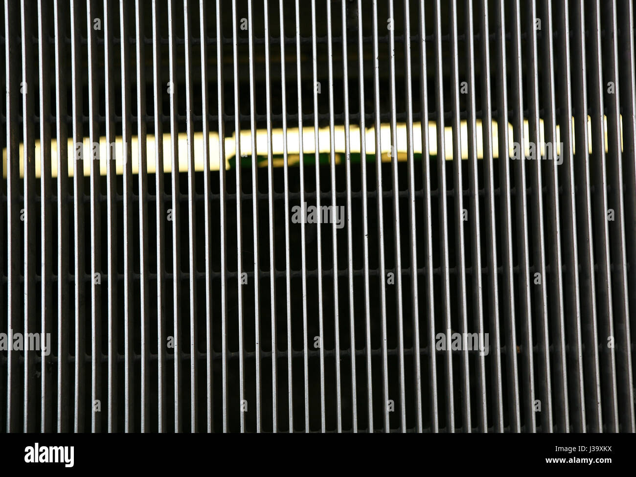 Drain grates with light background texture Stock Photo - Alamy