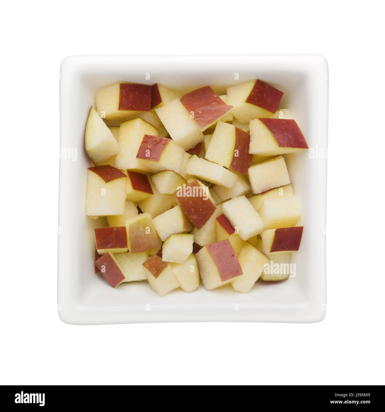 Diced red apple in a square bowl isolated on white background Stock ...
