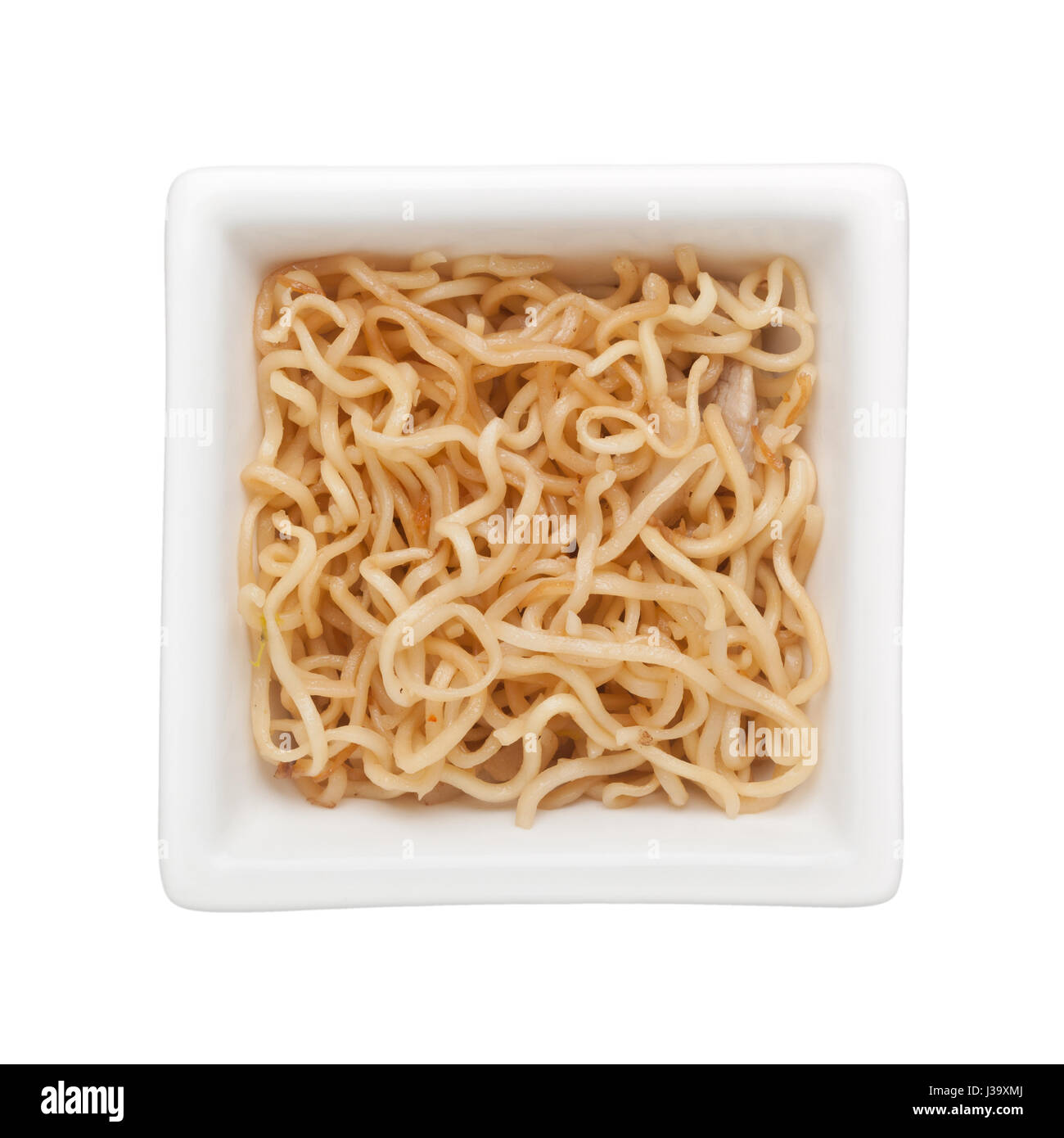 Stir fried noodle in a square bowl isolated on white background Stock ...