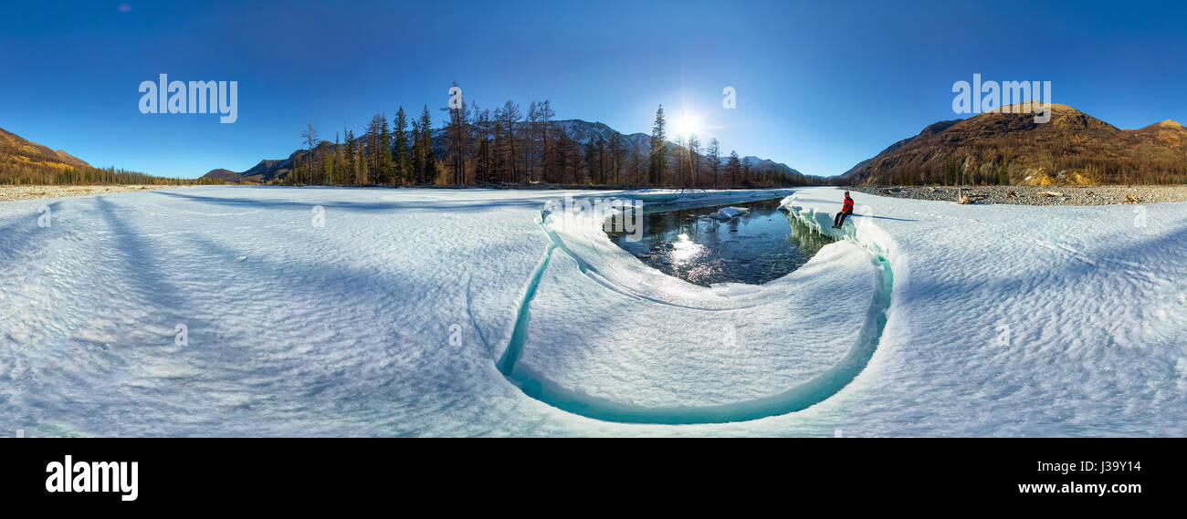 Cylindrical panorama of a man on ice melting river Stock Photo - Alamy