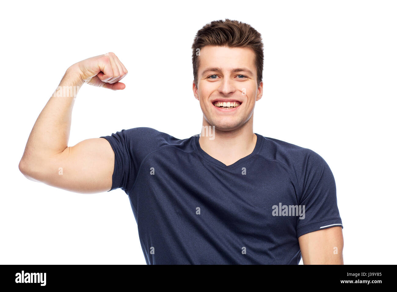 sportive man showing bicep power Stock Photo - Alamy