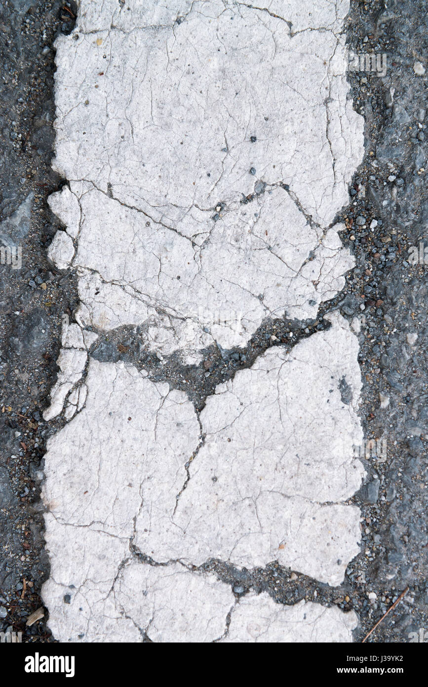 Detail of old white line on the road texture Stock Photo - Alamy