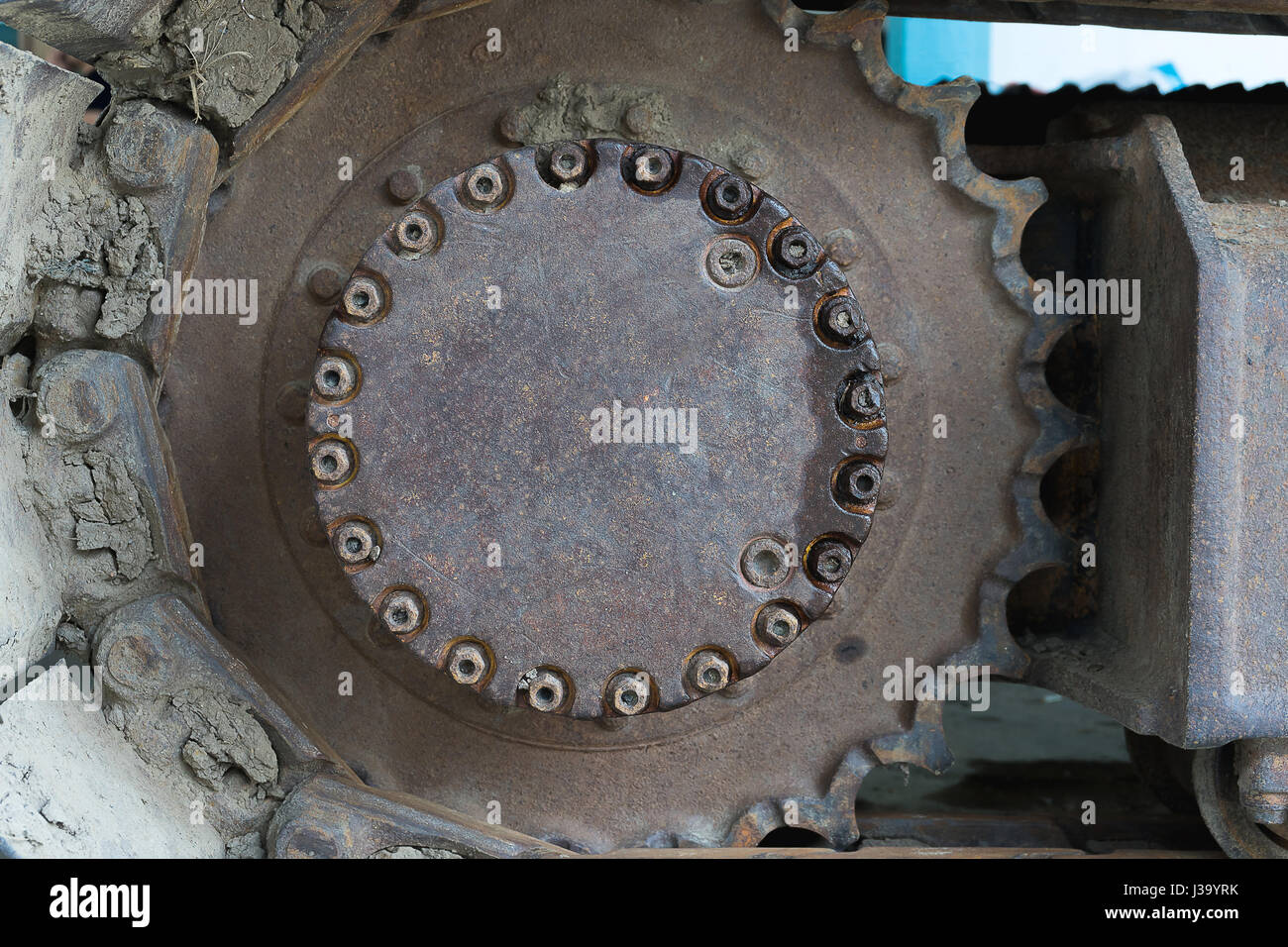 Detail of backhoe track with roller Stock Photo - Alamy