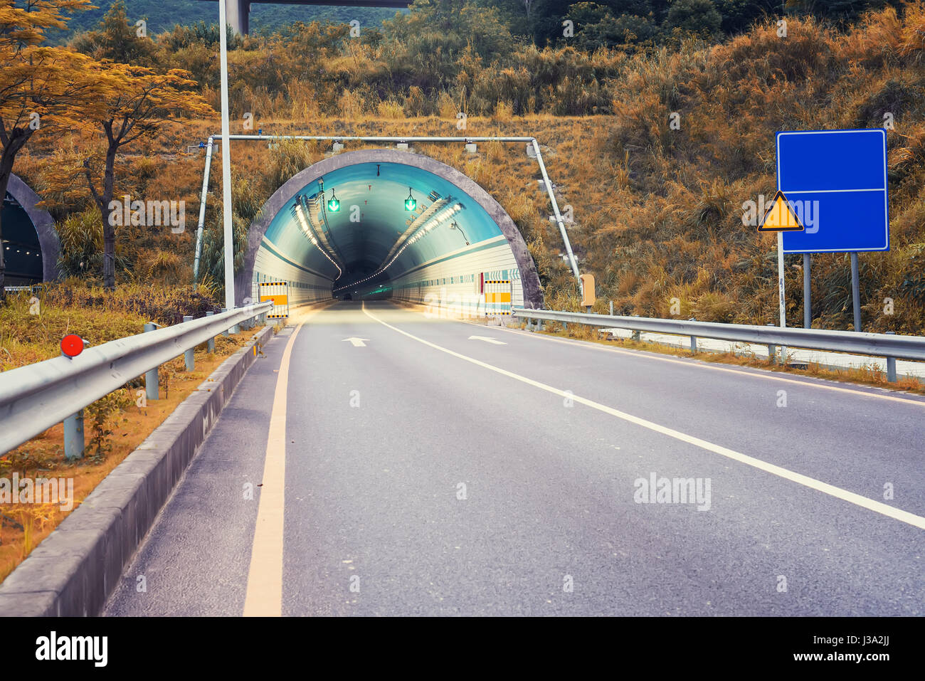 highway entrance to the tunnel Stock Photo - Alamy