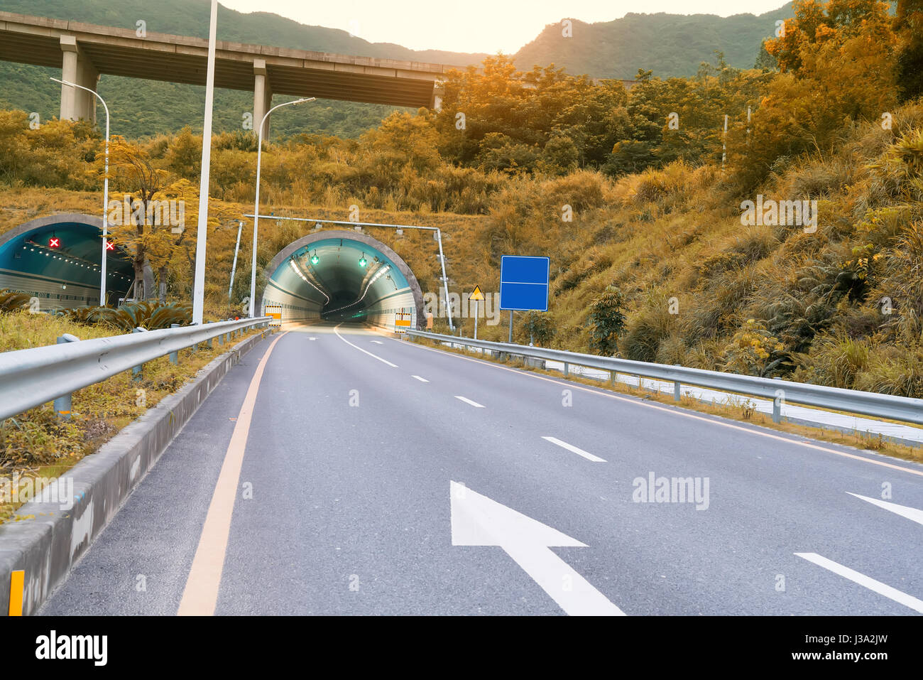 highway entrance to the tunnel Stock Photo - Alamy