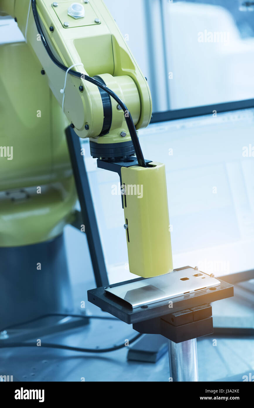 Robotic machine vision system in phone factory Stock Photo - Alamy