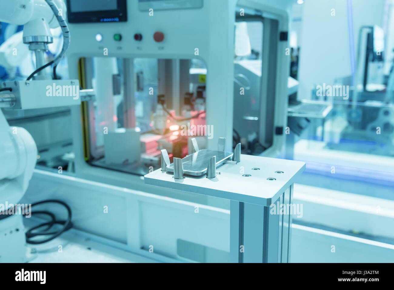 Mobile phone mold in Robotic machine system factory Stock Photo - Alamy