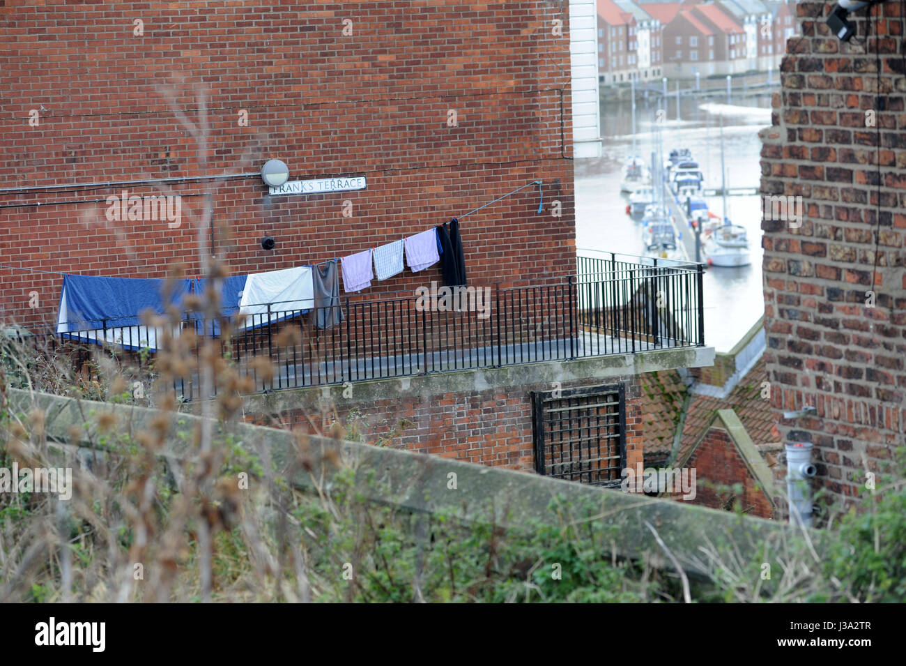 Washing line in back yard in Whitby, North Yorkshire Stock Photo - Alamy