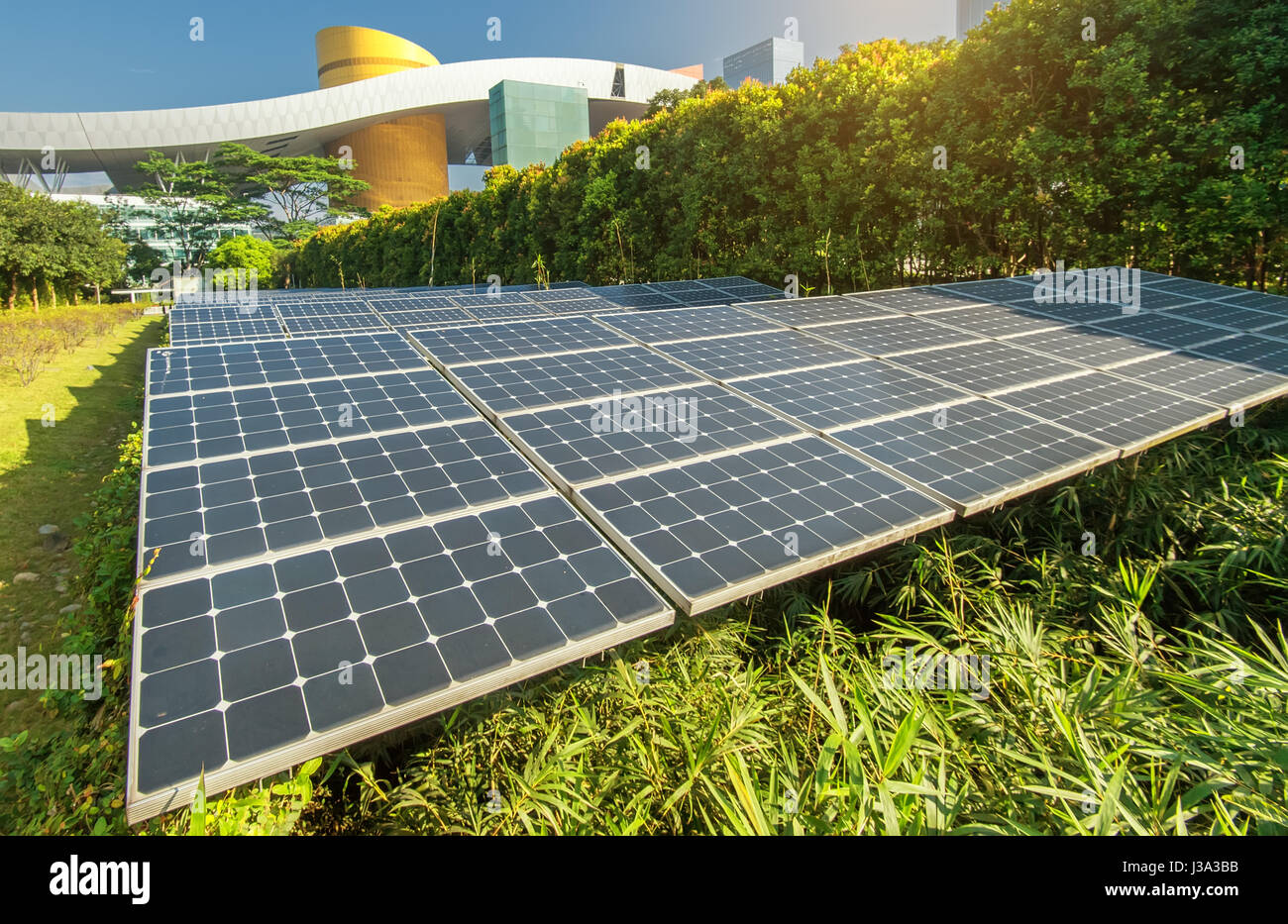 Solar Panels In The Park Of Modern City Stock Photo - Alamy