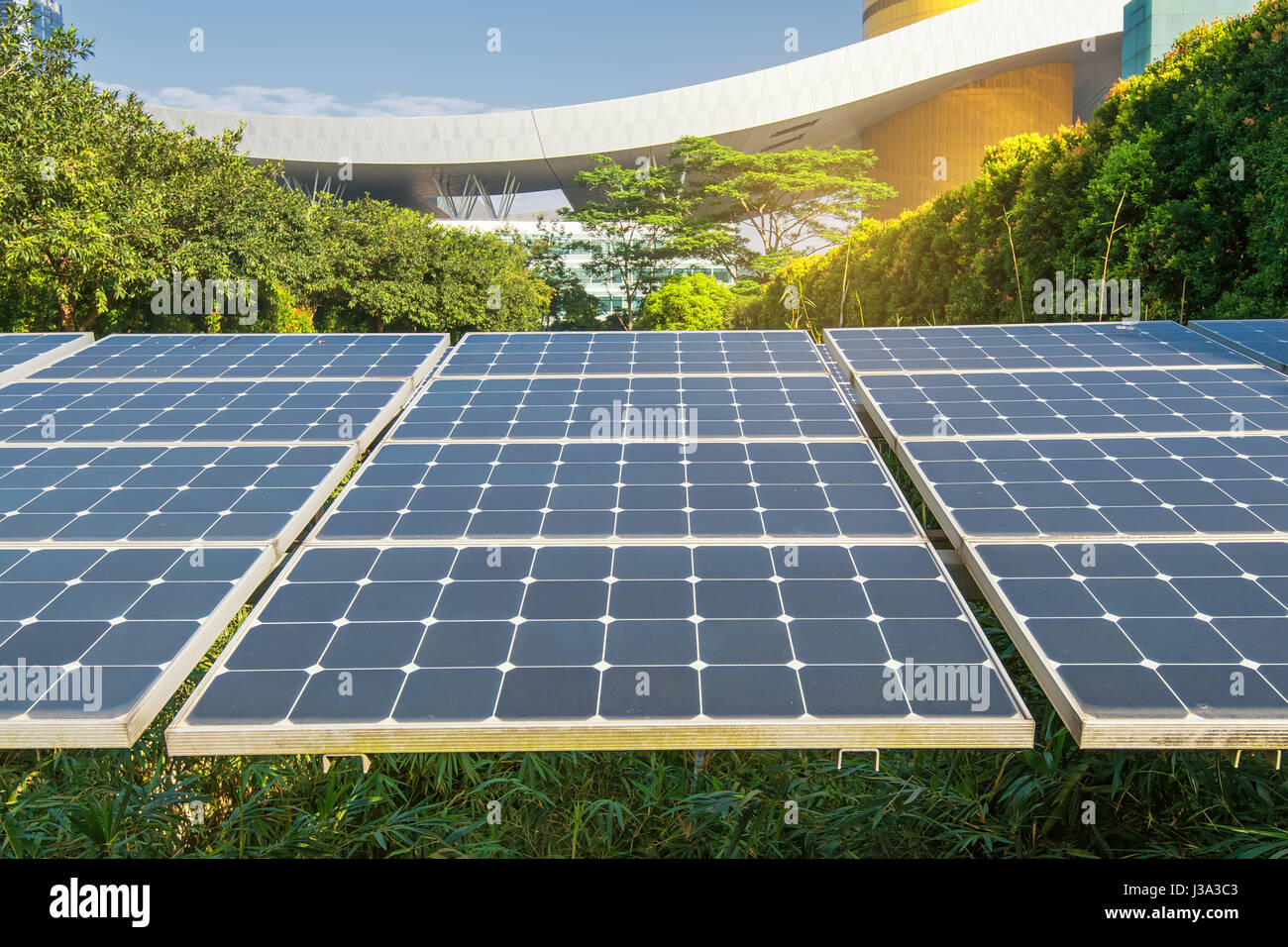 Solar Panels In The Park Of Modern City Stock Photo - Alamy