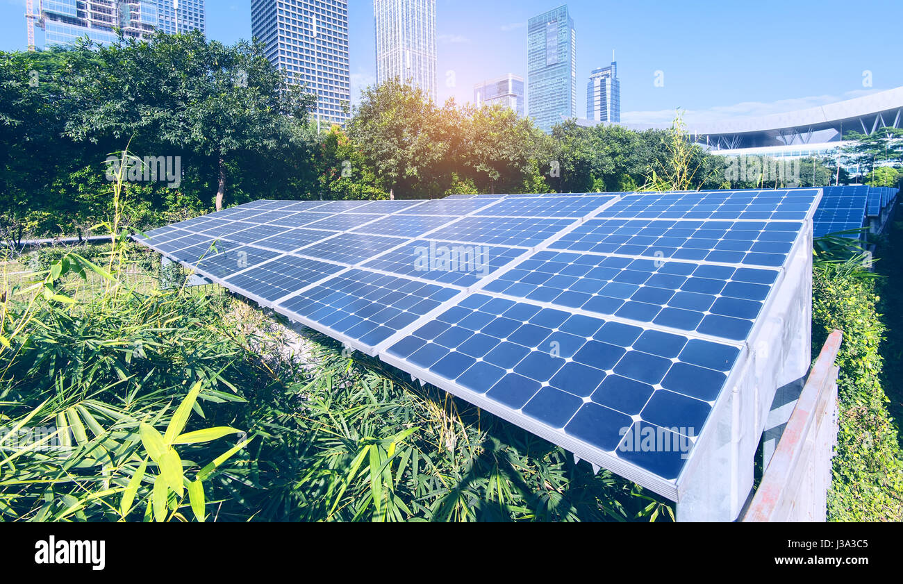 Solar Panels In The Park Of Modern City Stock Photo - Alamy