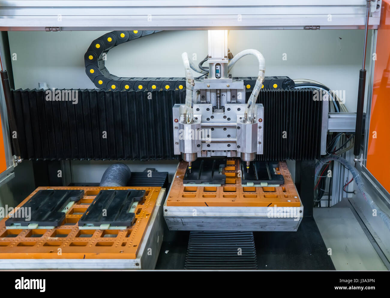 atuomatic screw feeder in cell phone assembly equipment factory Stock ...