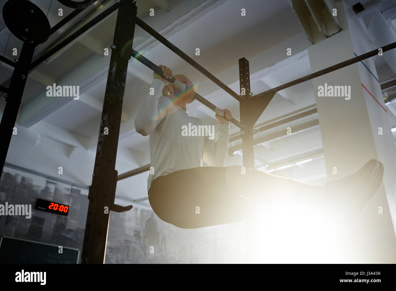 Intense Exercise in Gym Stock Photo - Alamy