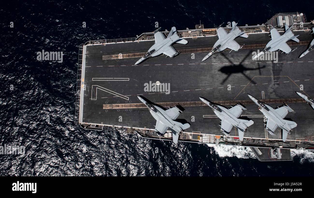 The U.S. Navy Nimitz-class aircraft carrier USS Theodore Roosevelt during training operations in ...