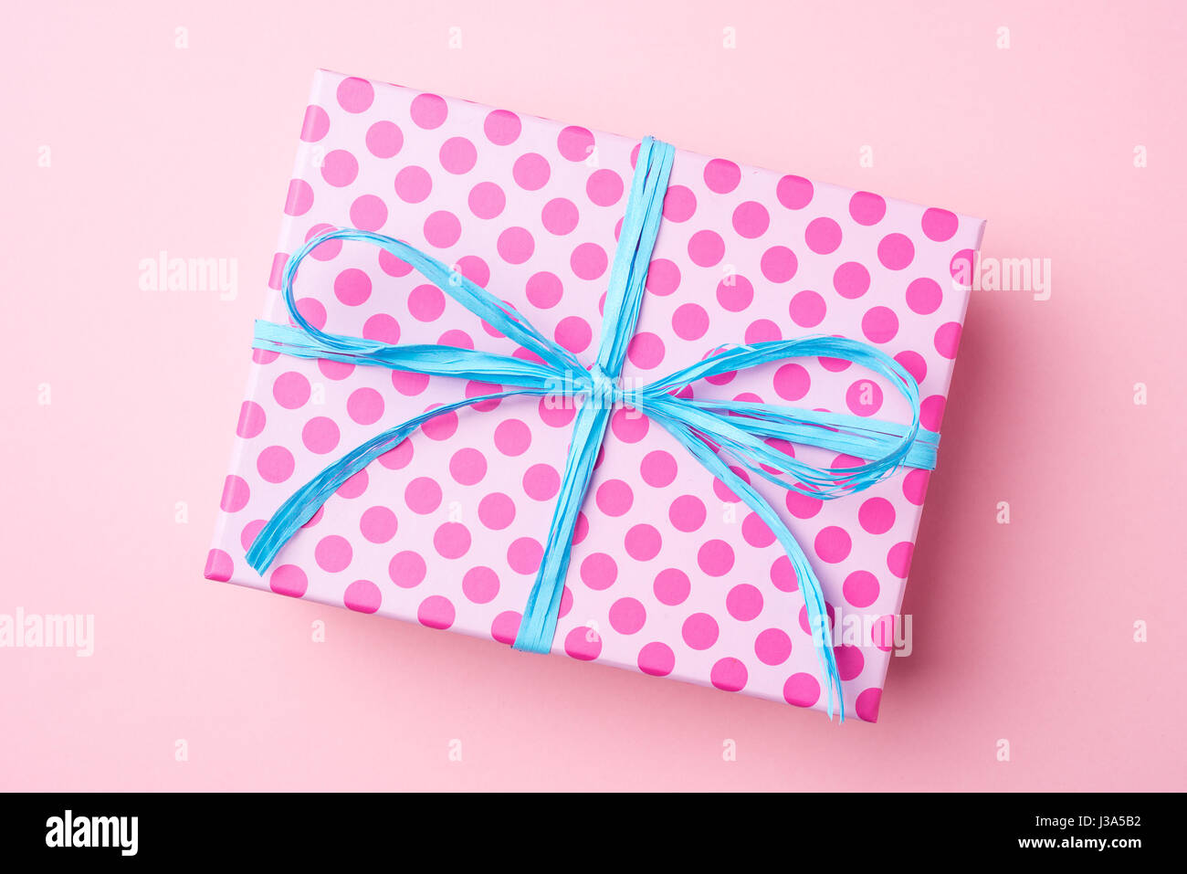 Pink dotted gift box Stock Photo - Alamy