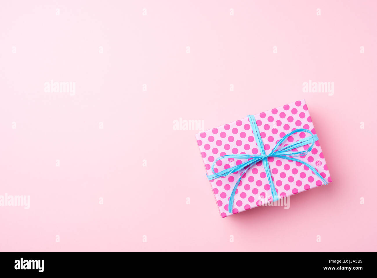 Gift box pink dotted hi-res stock photography and images - Alamy
