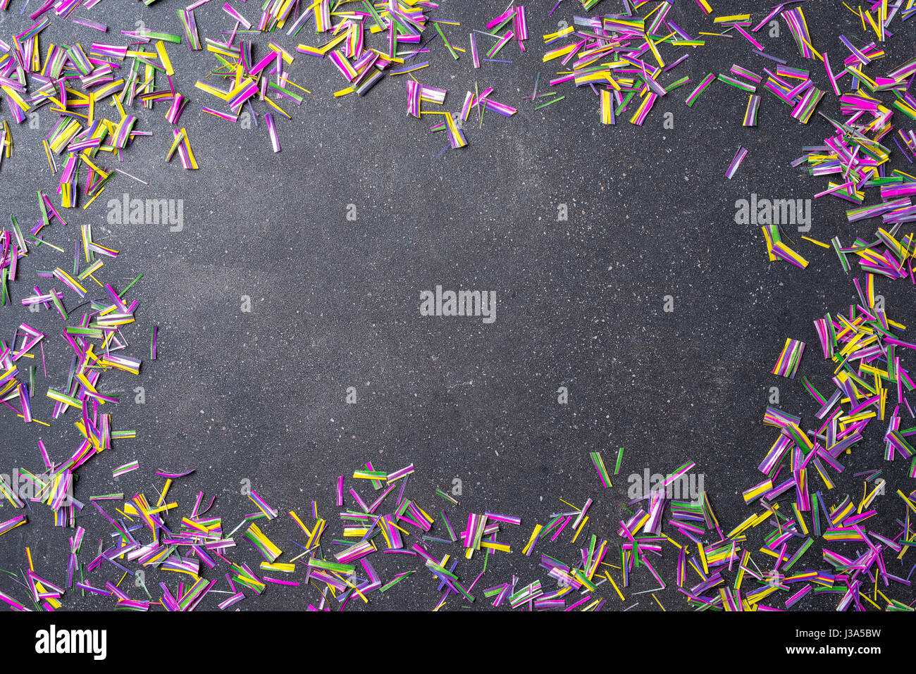 Birthday or party background on gray stone table Stock Photo - Alamy