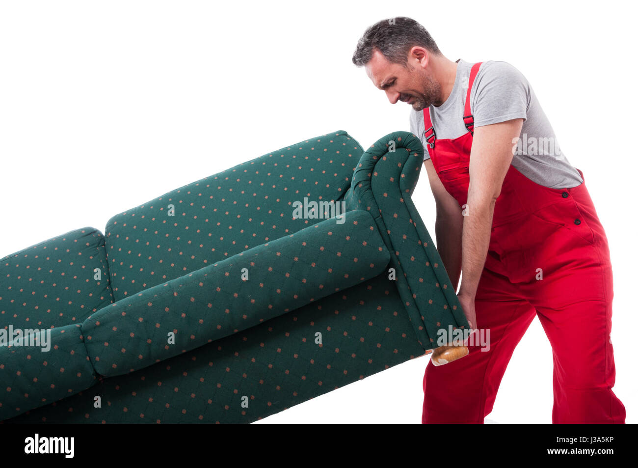 Mover guy lifting up a heavy couch isolated on white background Stock ...