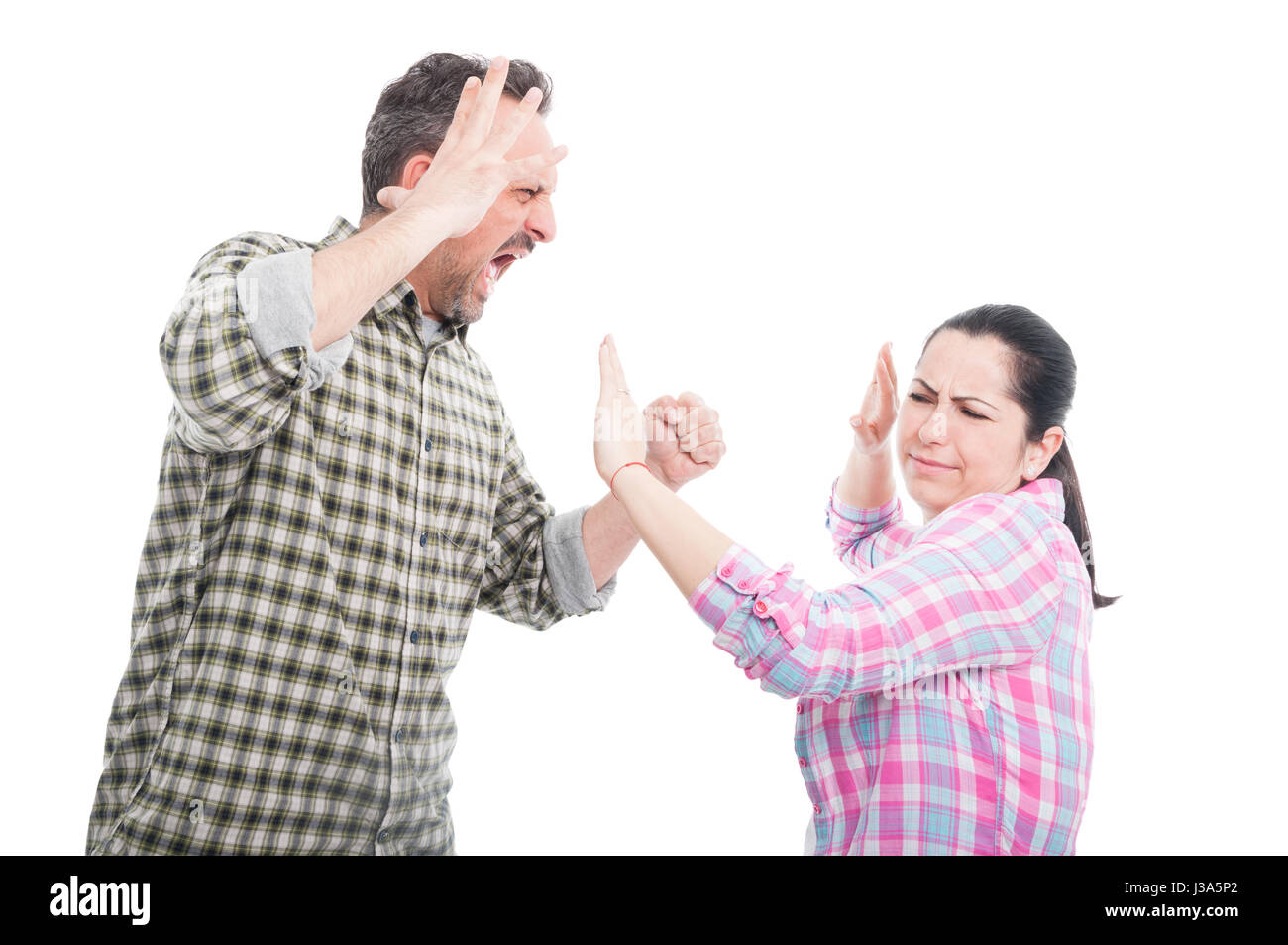 Married couple having a fight or altercation as domestic violence ...