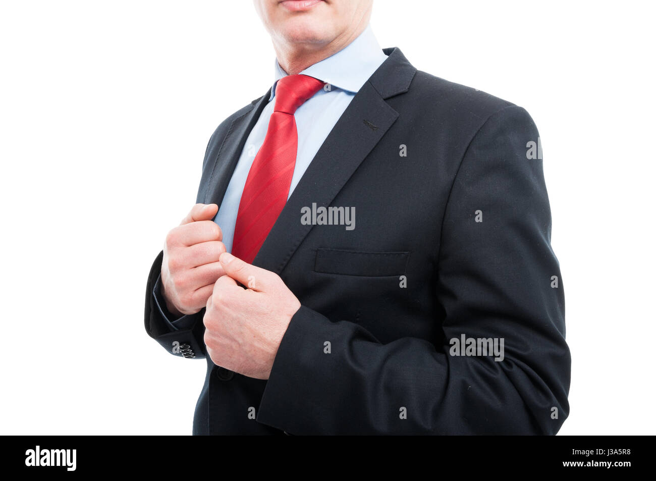 Close-up of senior business man holding suit jacket isolated on white ...