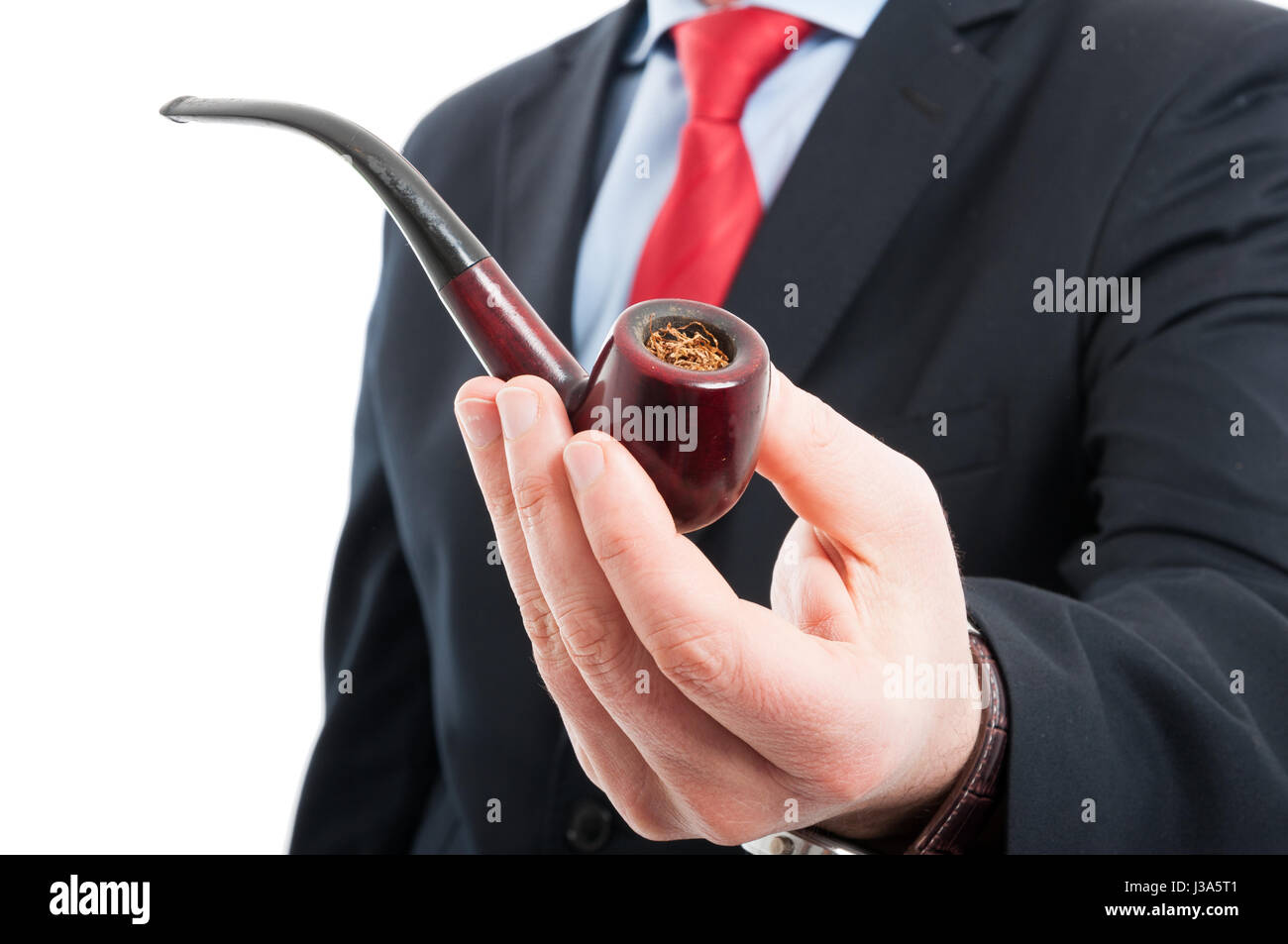 Close-up of middle age man holding a pipe showing the tobacco isolated ...
