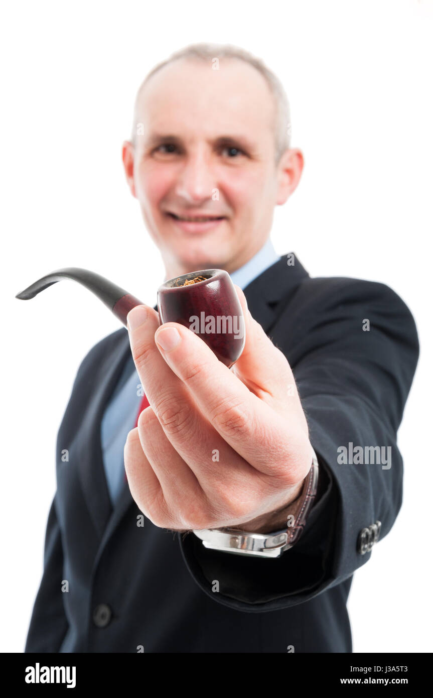 Selective focus of elegant man holding a pipe isolated on white ...