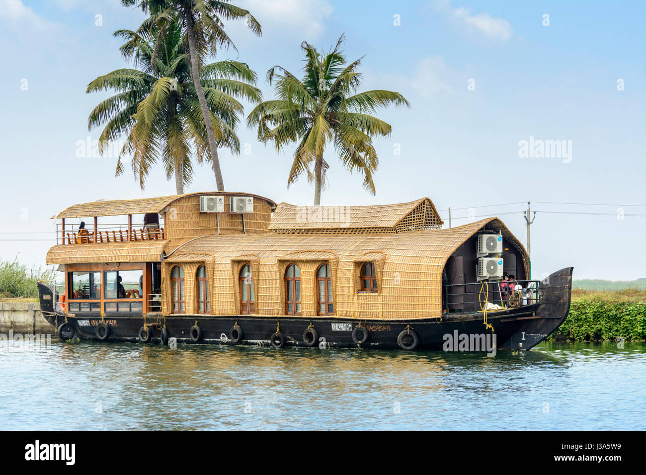 Traditional houseboat on the Kerala backwaters near Alleppey (Alappuzha ...