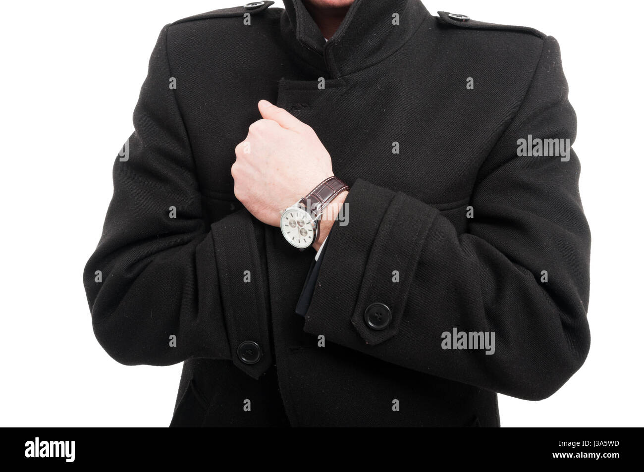 Close-up of elegant man posing wearing overcoat and watch isolated on ...