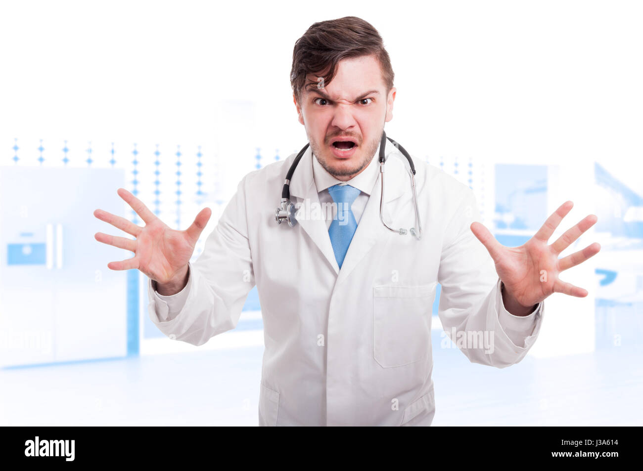 Angry young doctor showing rage and screaming as anxiety concept Stock ...