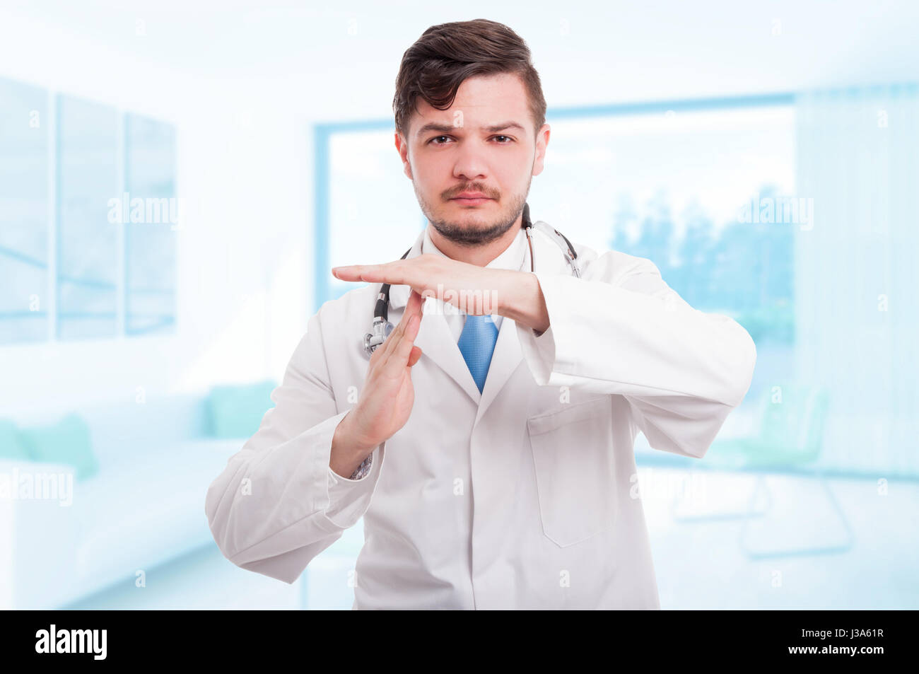 Time break hand symbol hi-res stock photography and images - Alamy