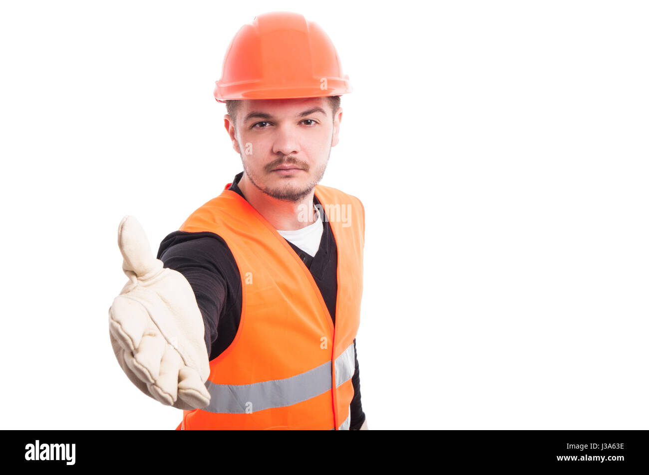 Attractive contractor doing a handshake or welcoming gesture on white ...