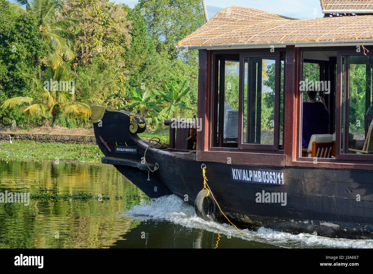Traditional houseboat on the Kerala backwaters near Alleppey (Alappuzha ...