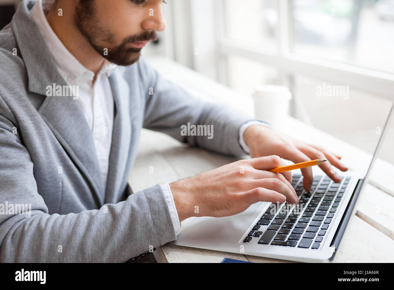 Working on Laptop during Coffee Break Stock Photo - Alamy