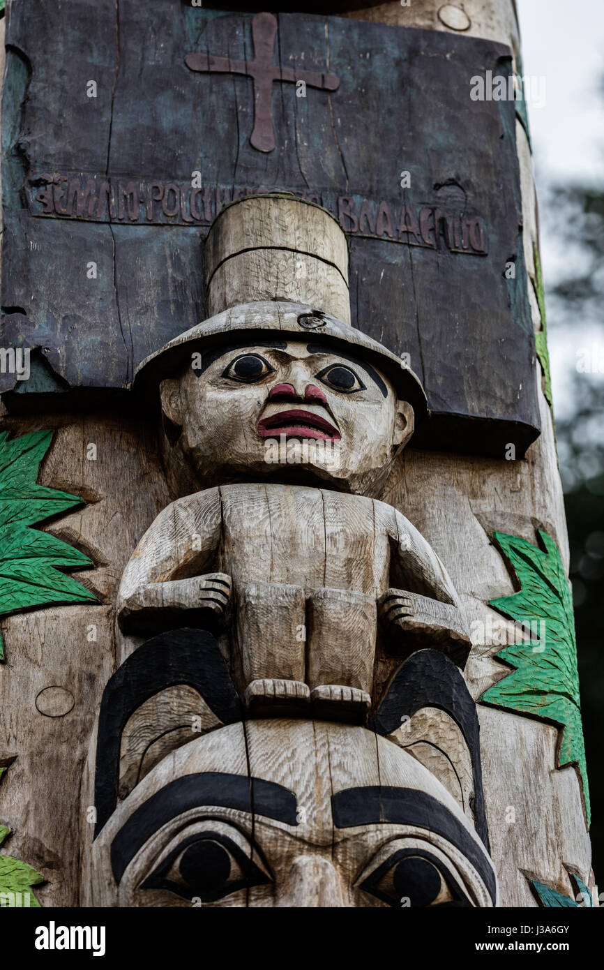 Native American totem poles in Alaska Stock Photo - Alamy